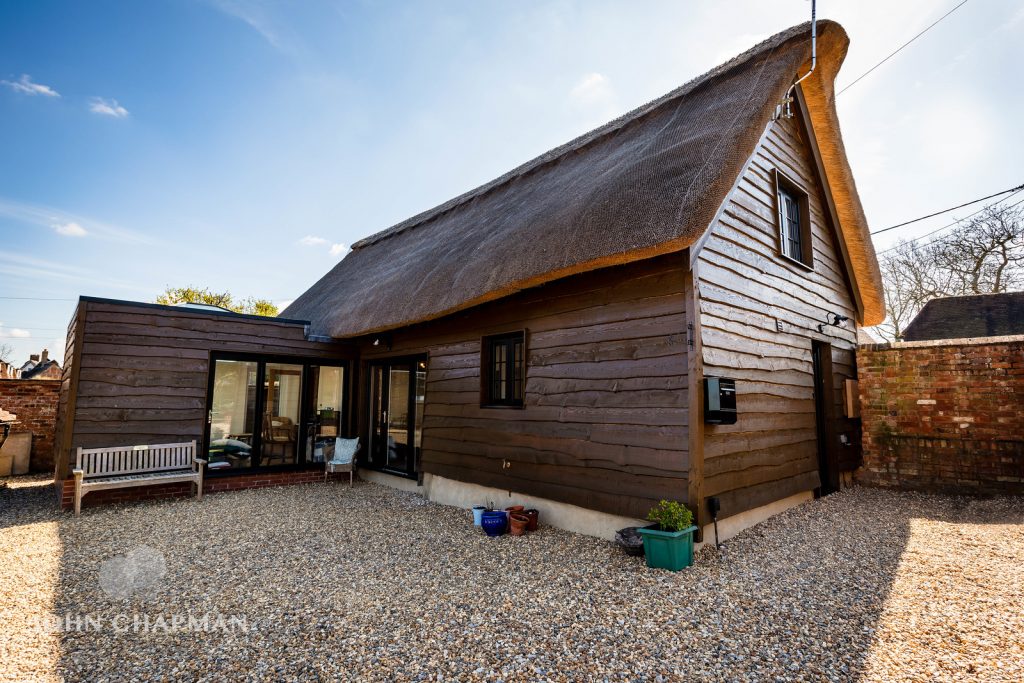 Waney Edge Cladding - Next Generation Construction